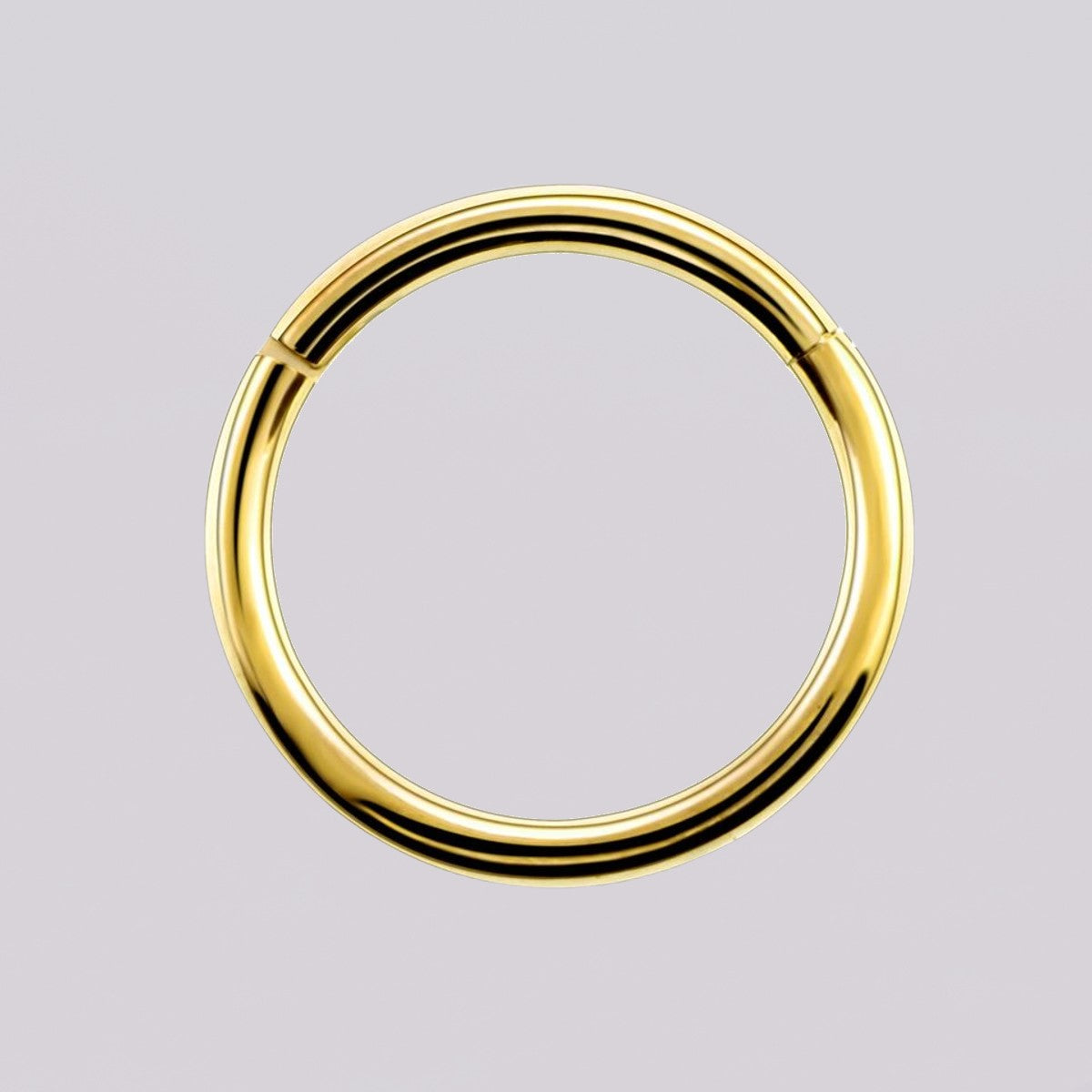 Golden Clicker ear piercing | Helix Body Jewelry